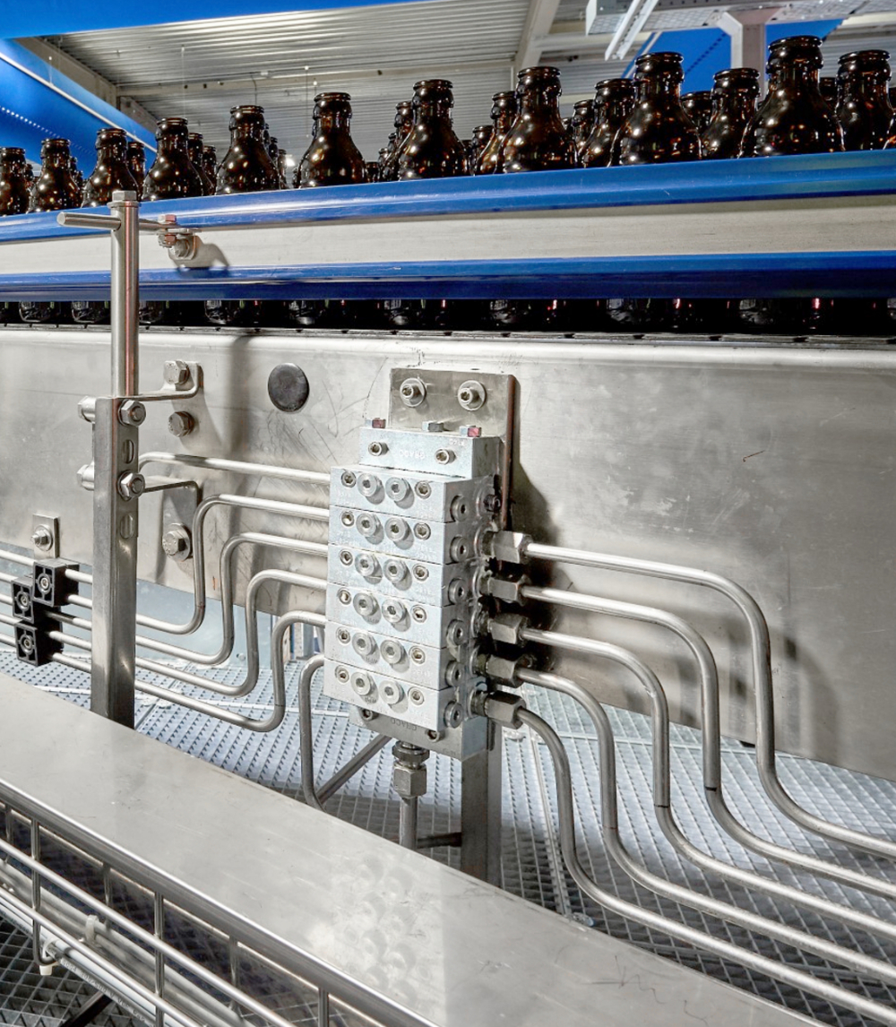 Un système de graissage automatique chez Duvel-Moortgat - Dobbit